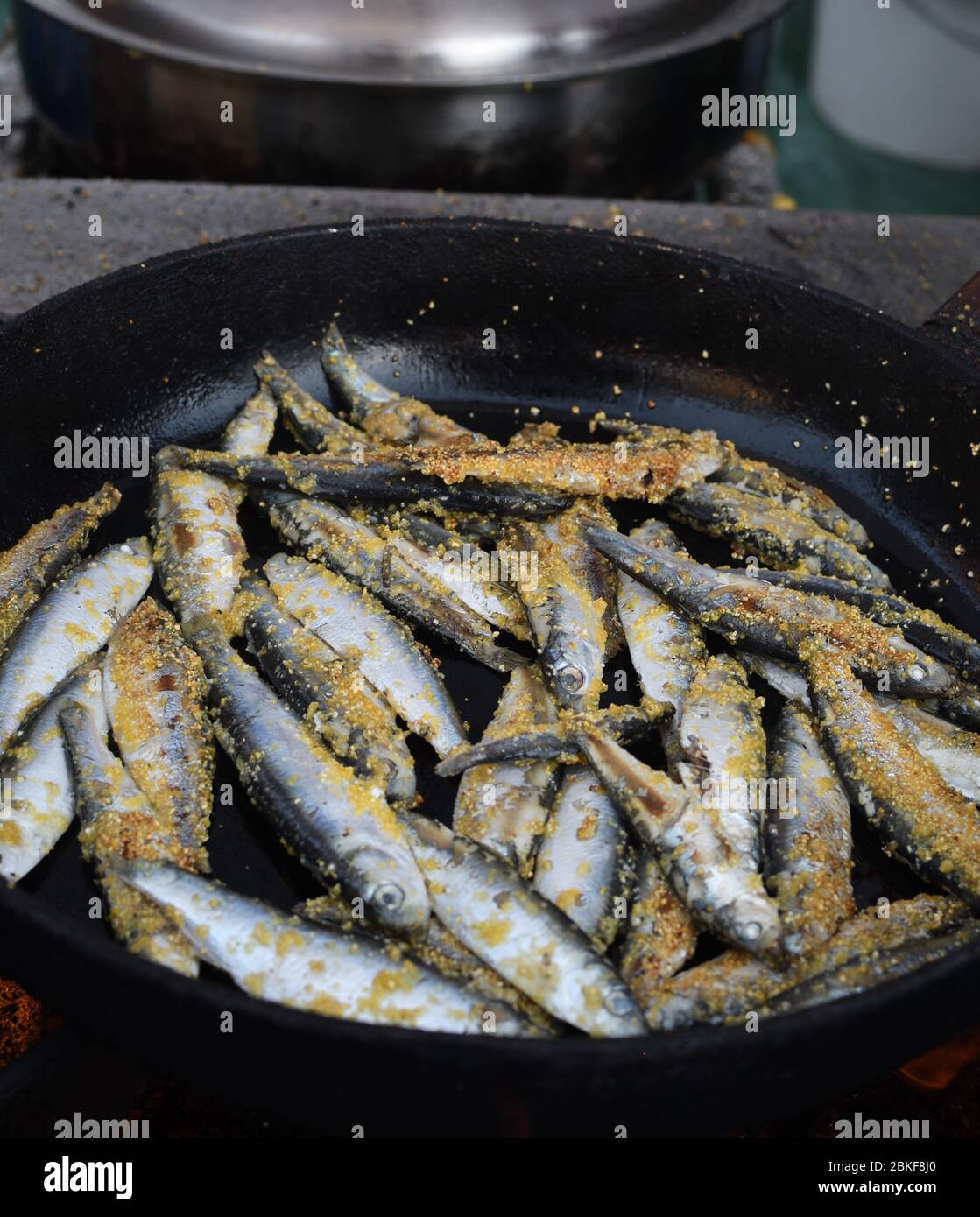 Freshly grilled fish on counter top stall, during seafood festival ...