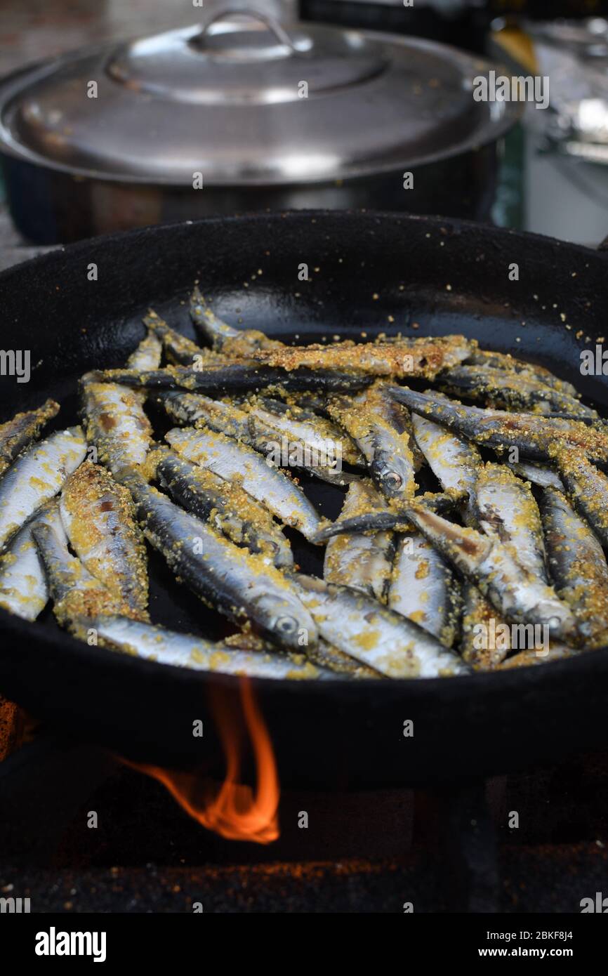 Freshly grilled fish on counter top stall, during seafood festival ...