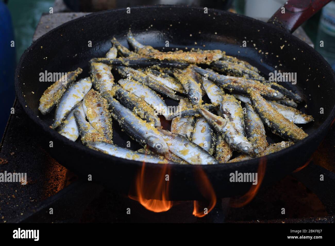 Freshly grilled fish on counter top stall, during seafood festival ...