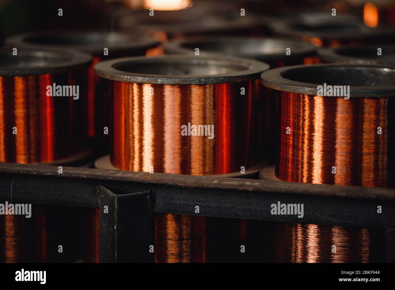 Production of copper wire, bronze cable in reels at factory Stock Photo ...