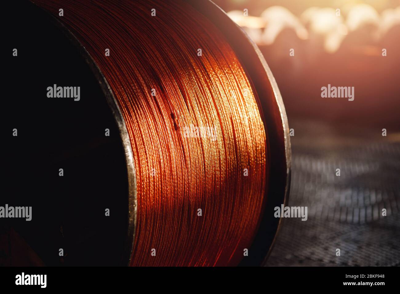 Production of copper wire, bronze cable in reels at factory Stock Photo ...