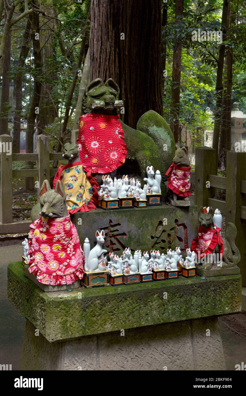 Kitsune fox deities, Kashima Jingu forest, Kashima, Japan. Inari is the ...