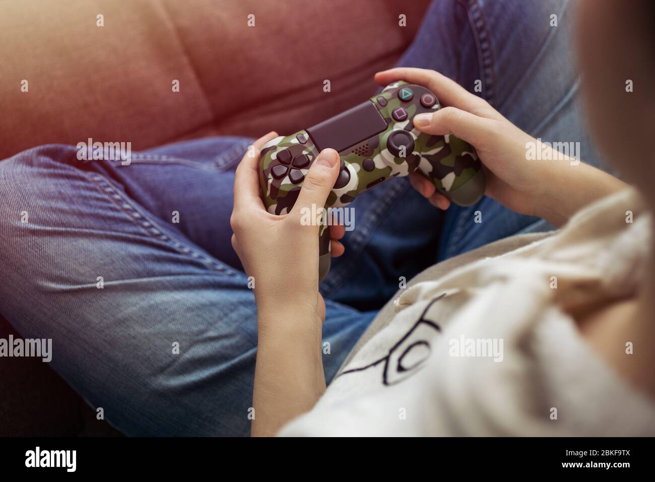 Toronto, Canada - May, 2, 2020: Wireless controller joystick in woman's ...