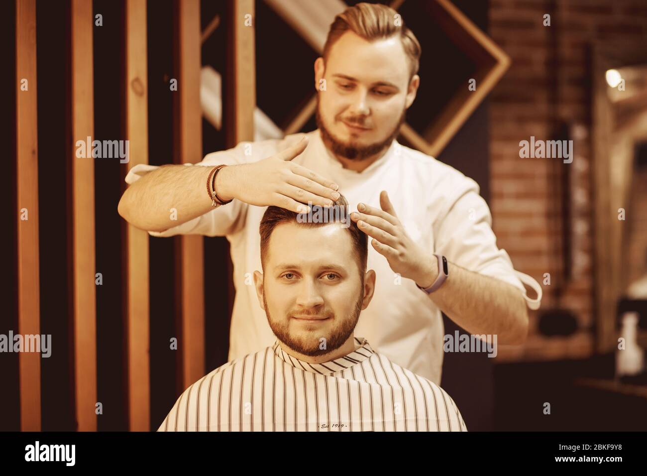 Barbershop, Man with beard in barber shop. Modern hair salon Stock ...