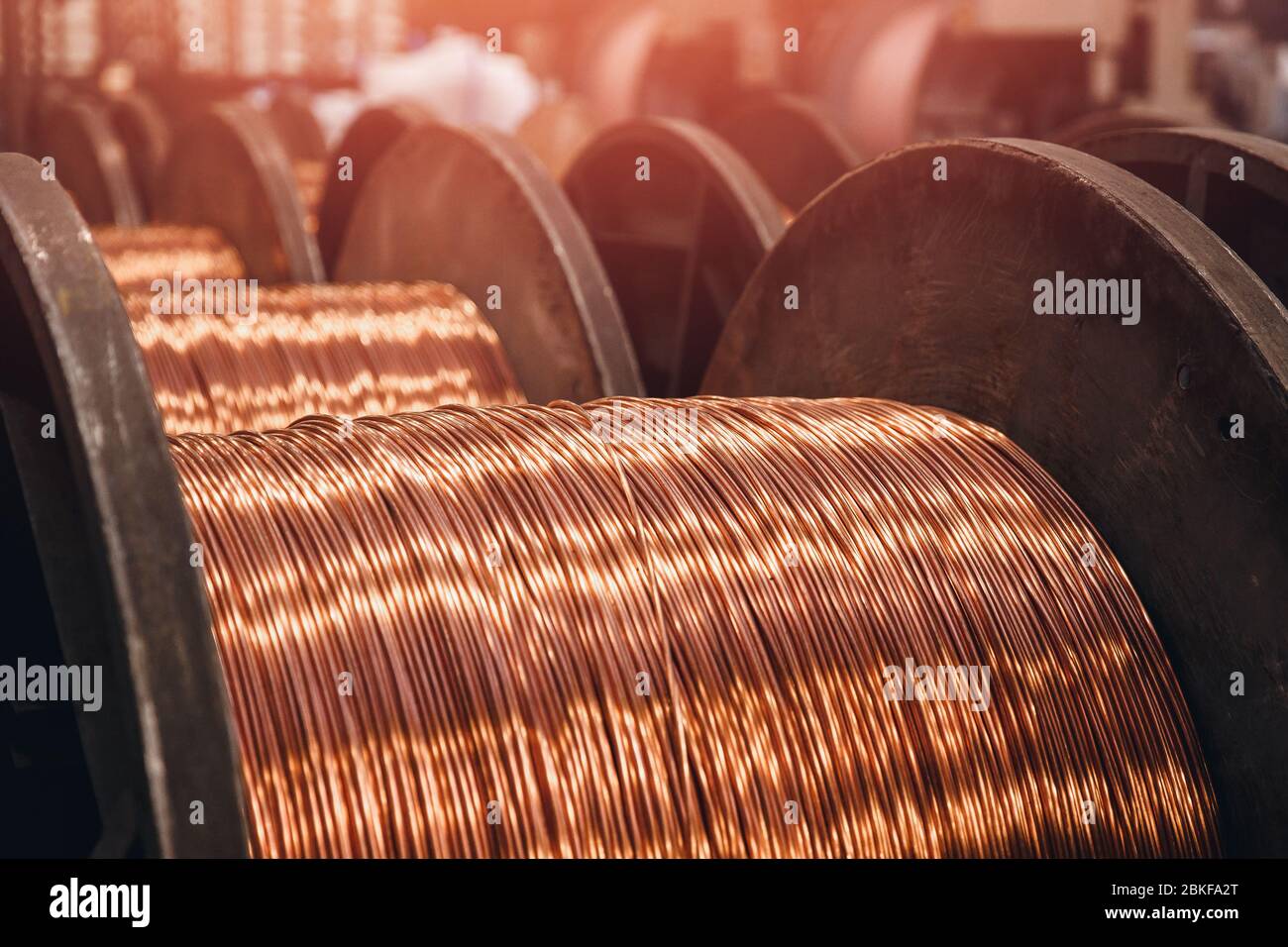Production of copper wire, bronze cable in reels at factory Stock Photo ...