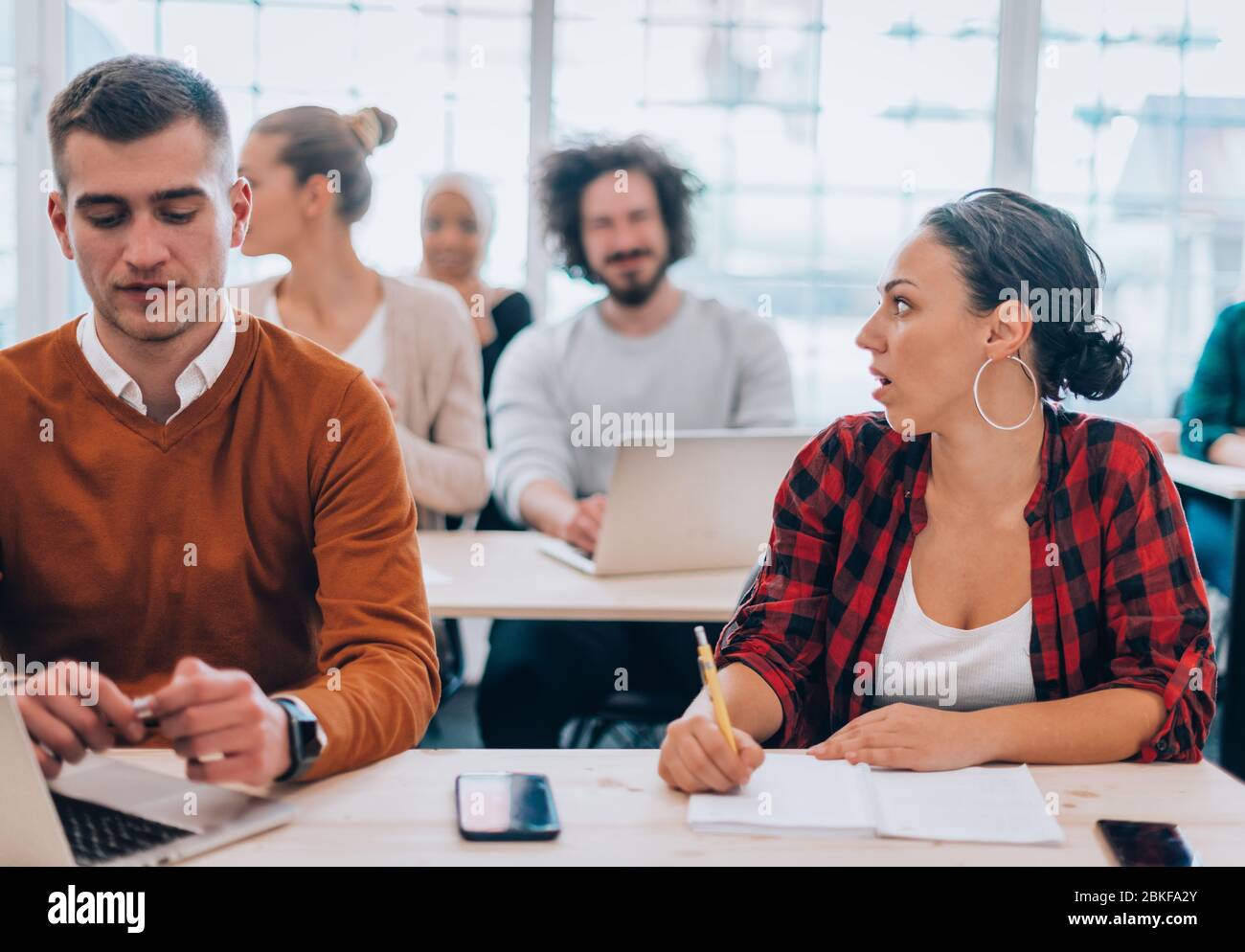 Work colleagues learning new marketing strategies at corporate training ...