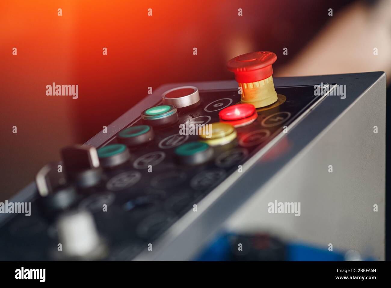 Control buttons in industrial production, blurred background. Heavy ...