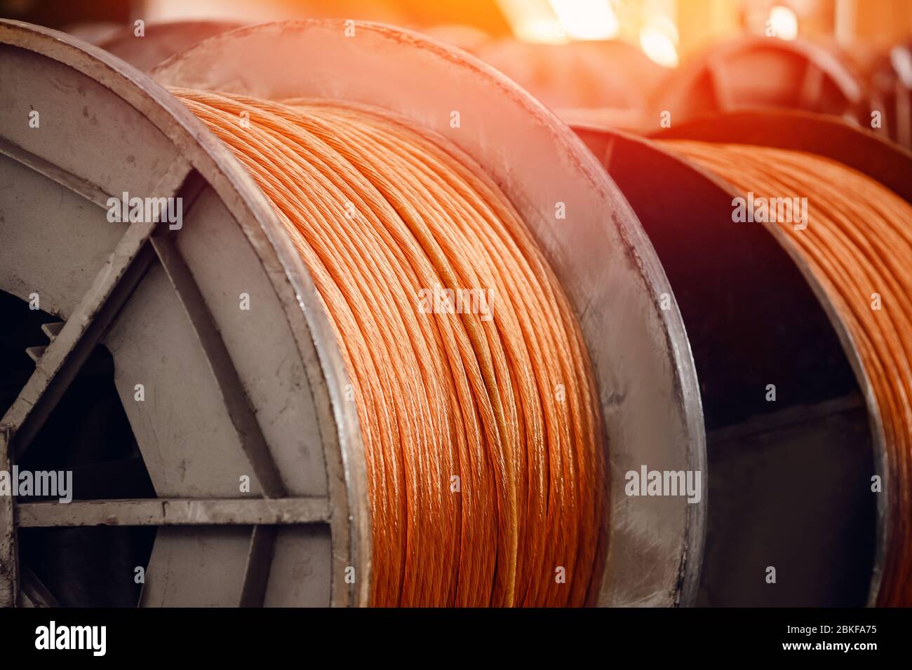 Production of copper wire, bronze cable in reels at factory Stock Photo ...