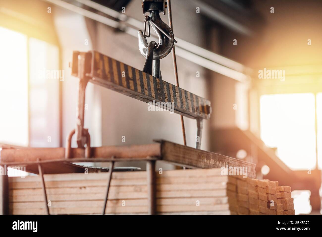 Crane chain and hook with blurred warehouse background. Concept ...