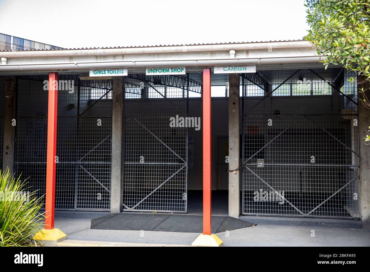 Sydney school with signs for uniform store shop canteen and girls ...