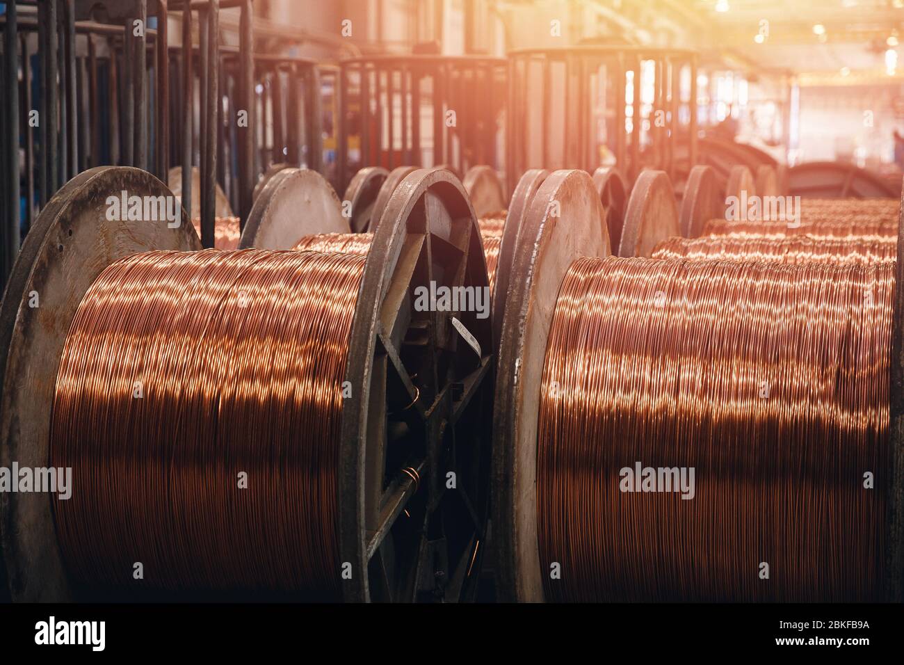 Production of copper wire, bronze cable in reels at factory Stock Photo ...