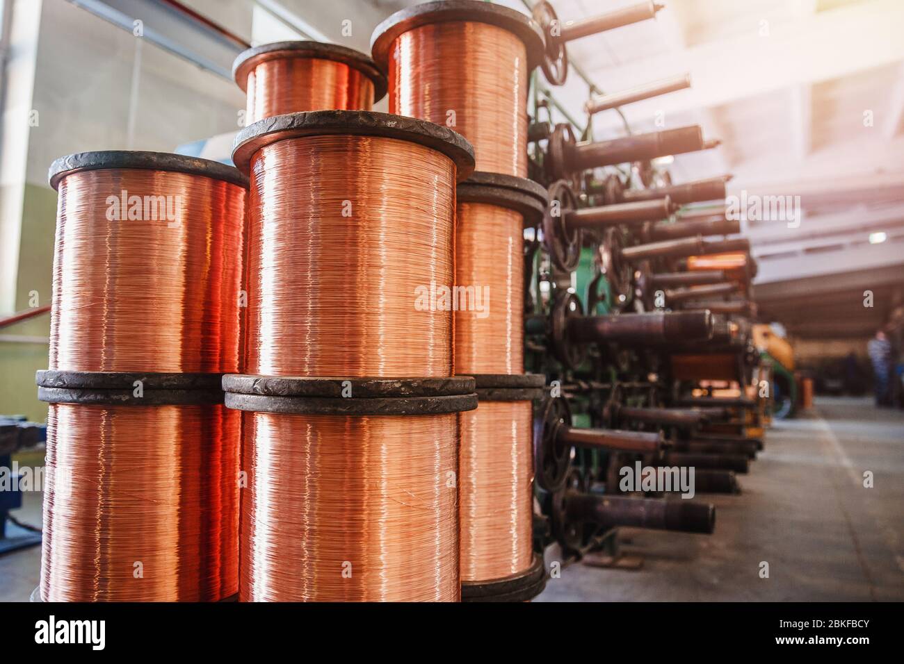Production of copper wire, bronze cable in reels at factory Stock Photo ...