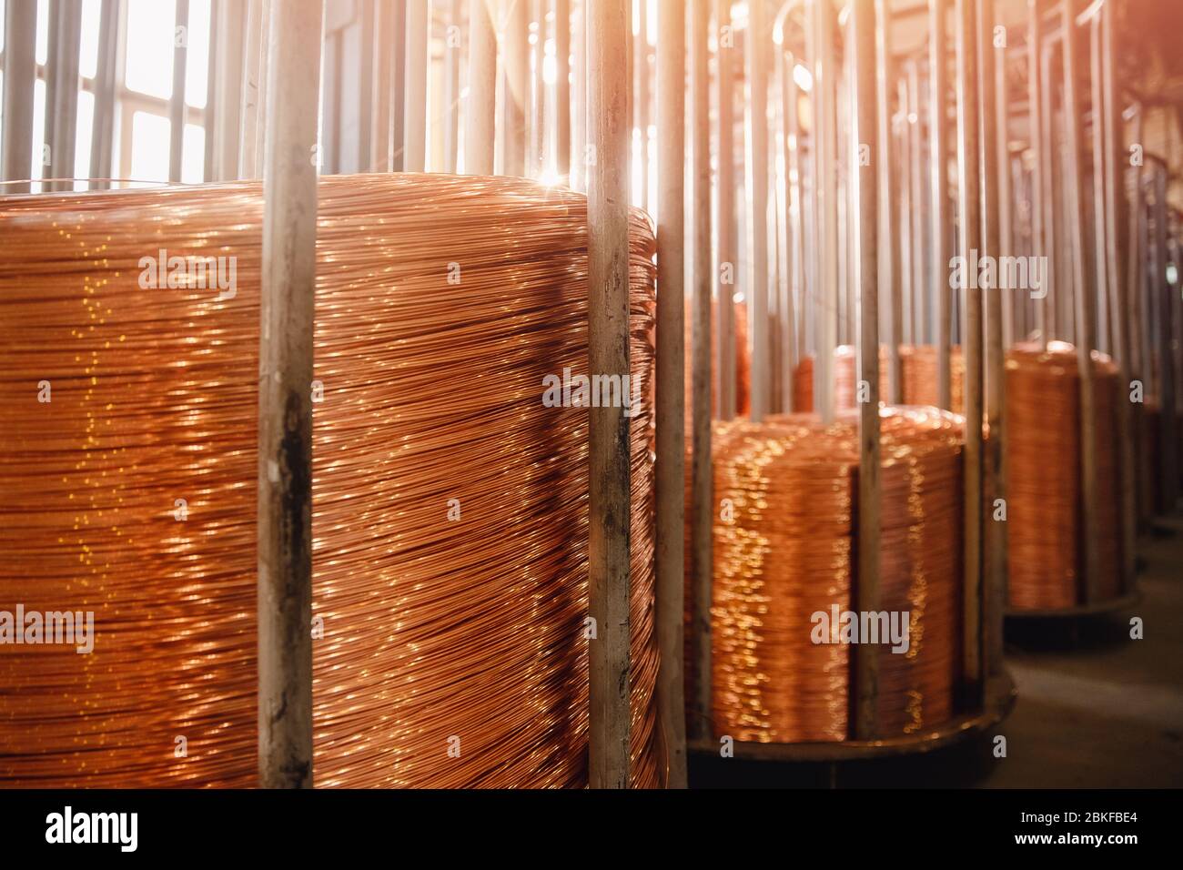 Production of copper wire, bronze cable in reels at factory Stock Photo ...