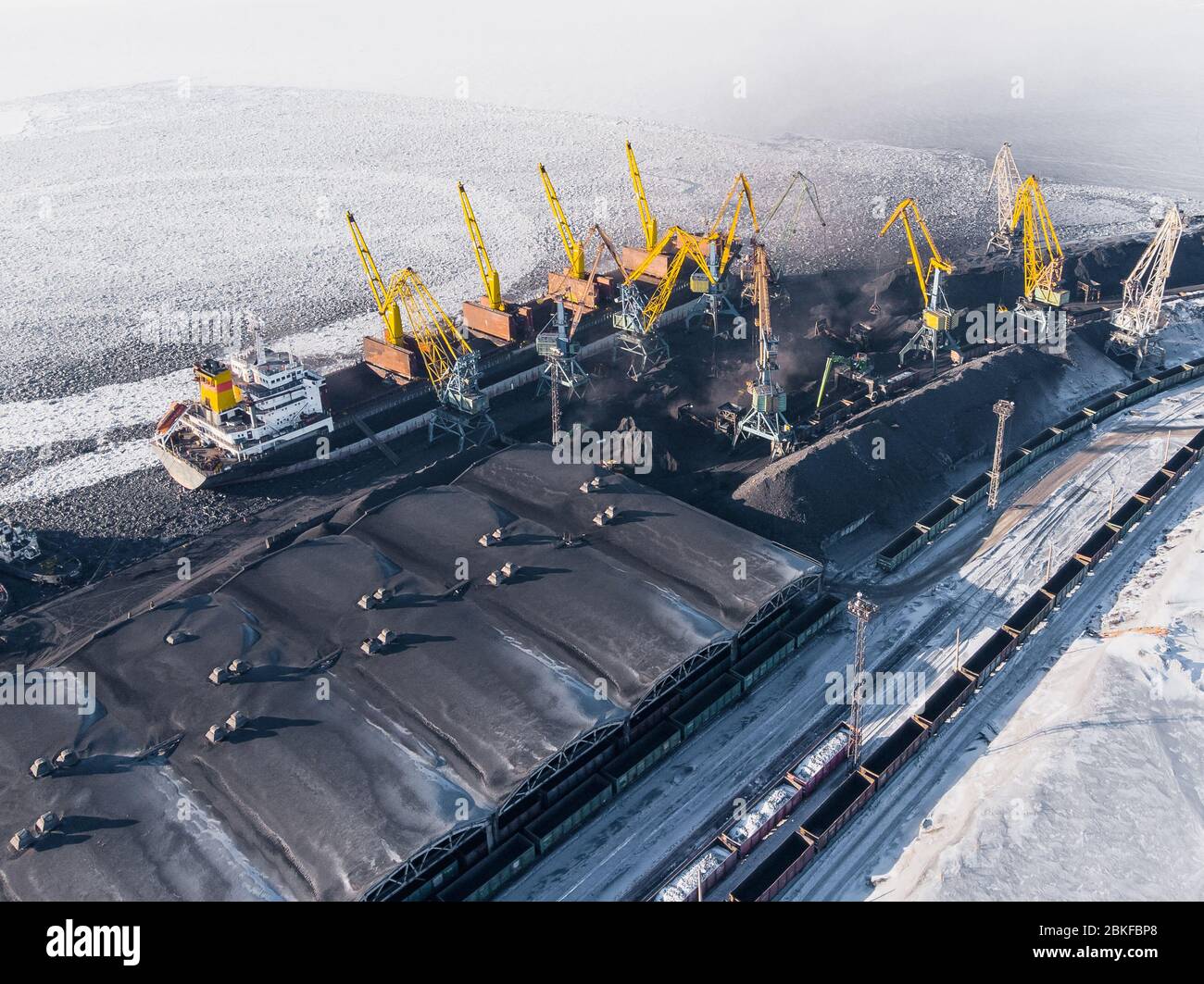Industrial photo, Loading coal mining in port ship with crane. Aerial ...