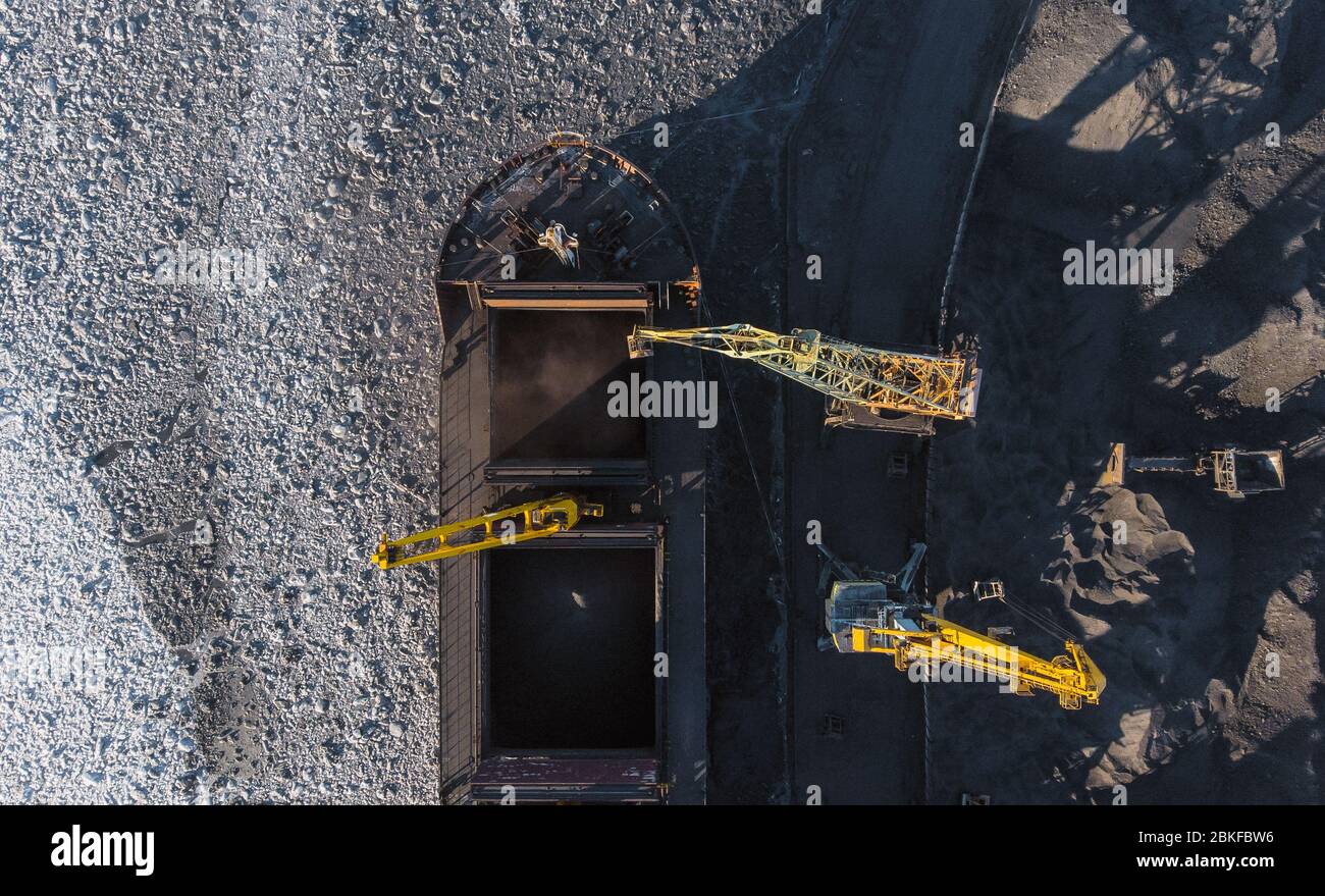 Industrial photo, Loading coal mining in port ship with crane. Aerial ...