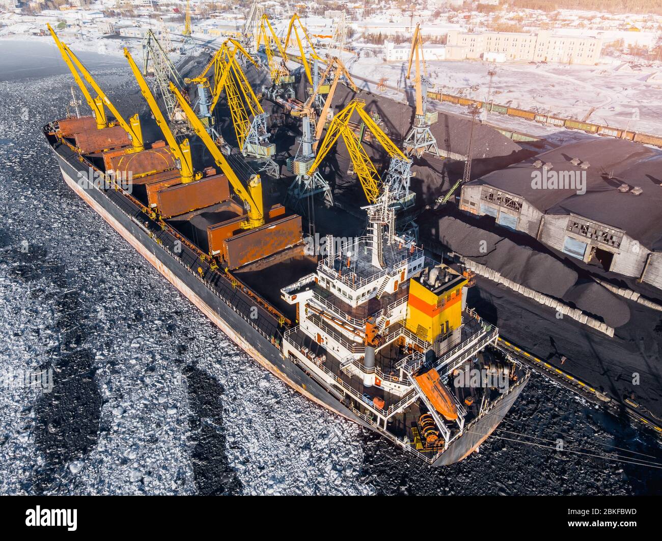 Industrial photo, Loading coal mining in port ship with crane. Aerial ...