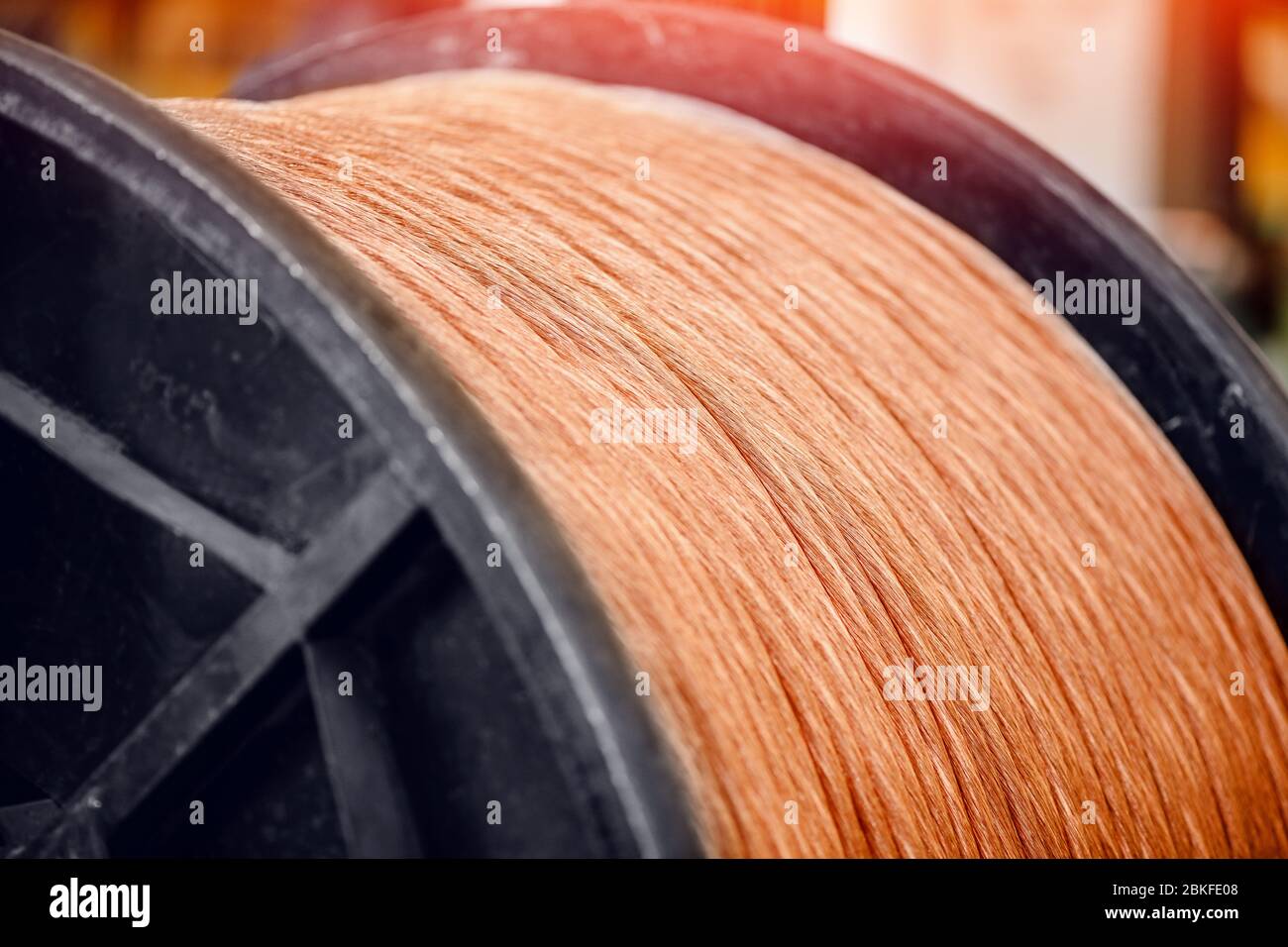 Production of copper wire, bronze cable in reels at factory Stock Photo ...