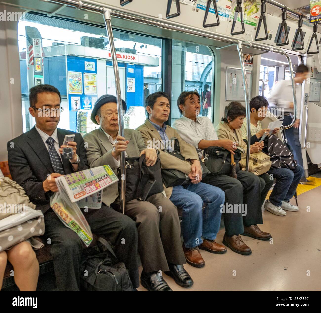 Commuters, Tokyo subway, Japan Stock Photo - Alamy