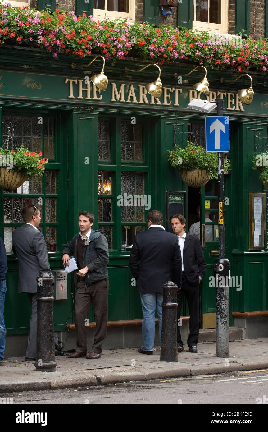 People standing outside a London pub, the Market Porter,London, England ...