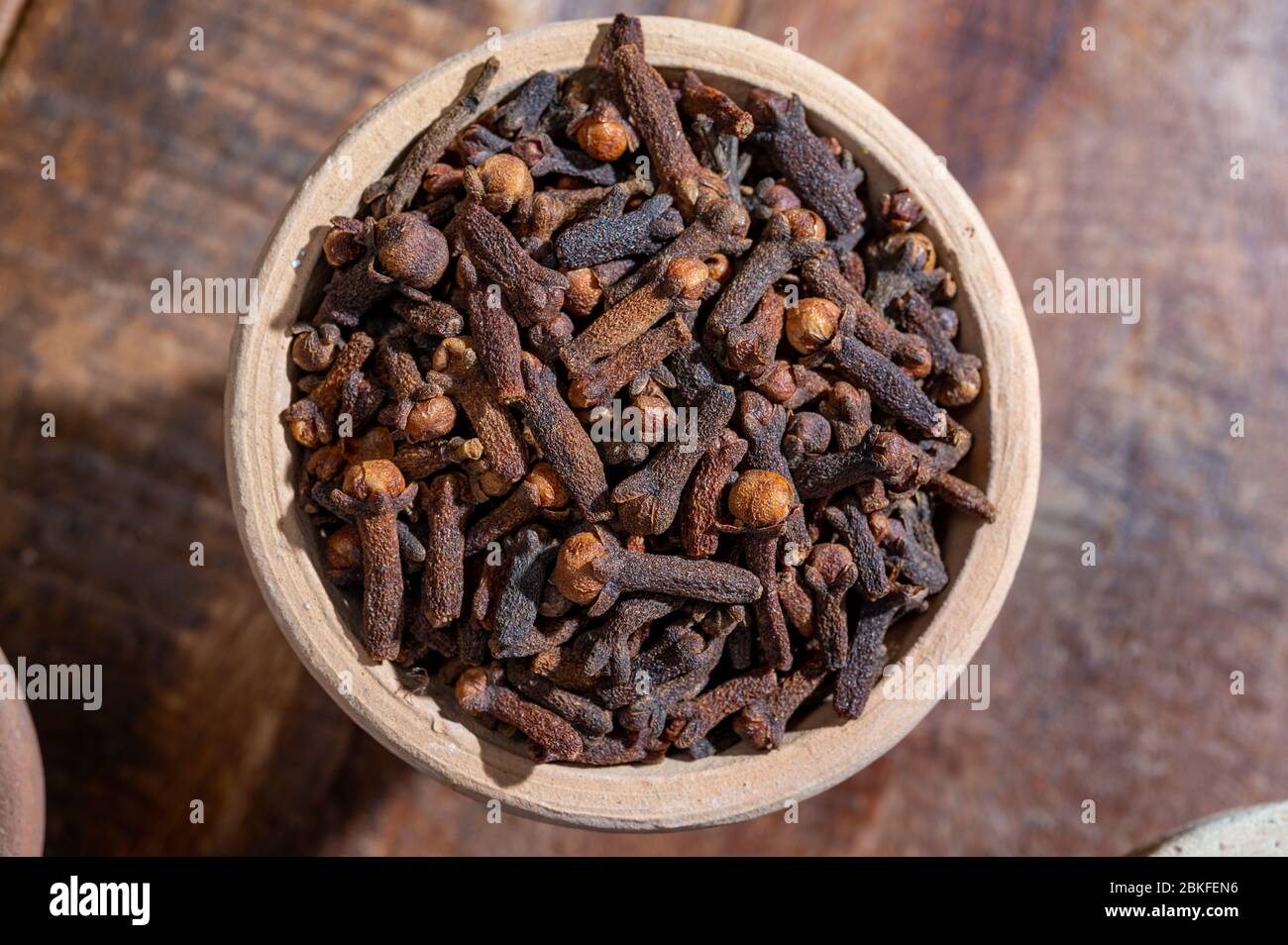 Indian spices collection, dried aromatic cloves flower buds and another ...