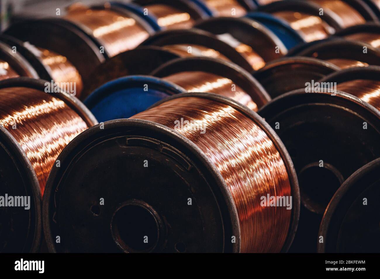 Production of copper wire, bronze cable in reels at factory Stock Photo ...
