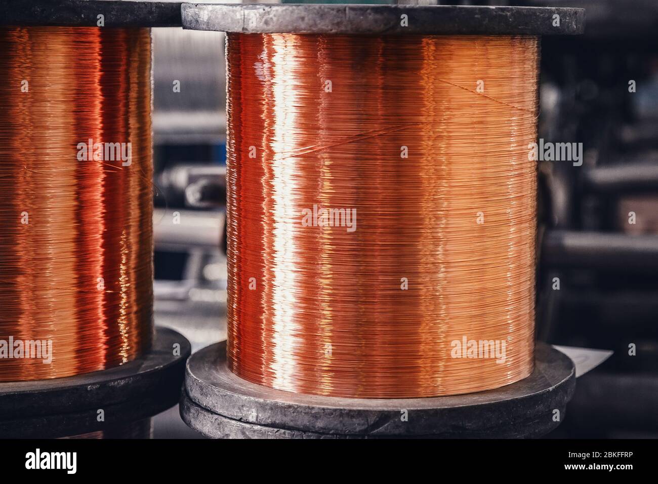 Production of copper wire, bronze cable in reels at factory Stock Photo ...