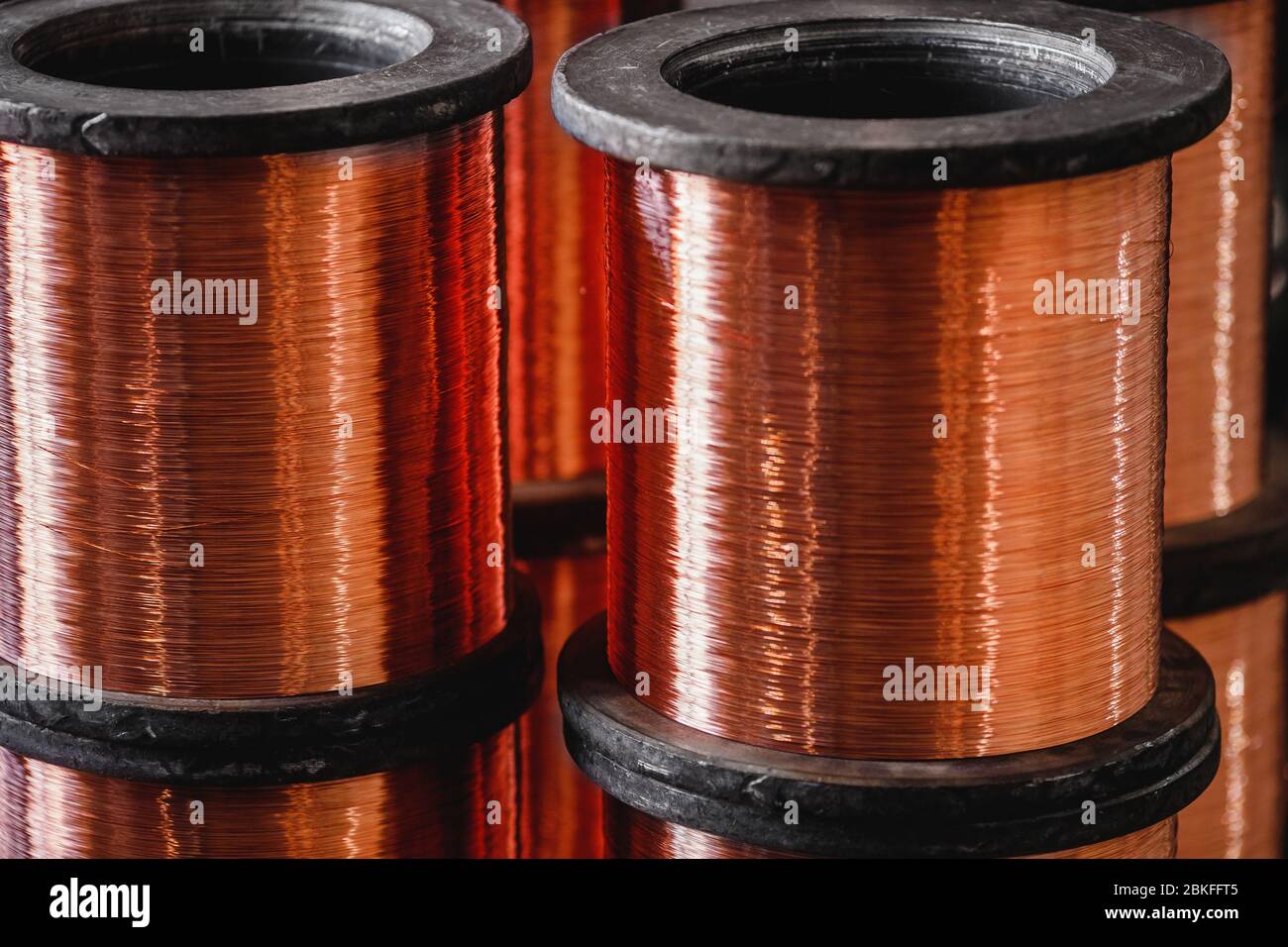 Production of copper wire, bronze cable in reels at factory Stock Photo ...