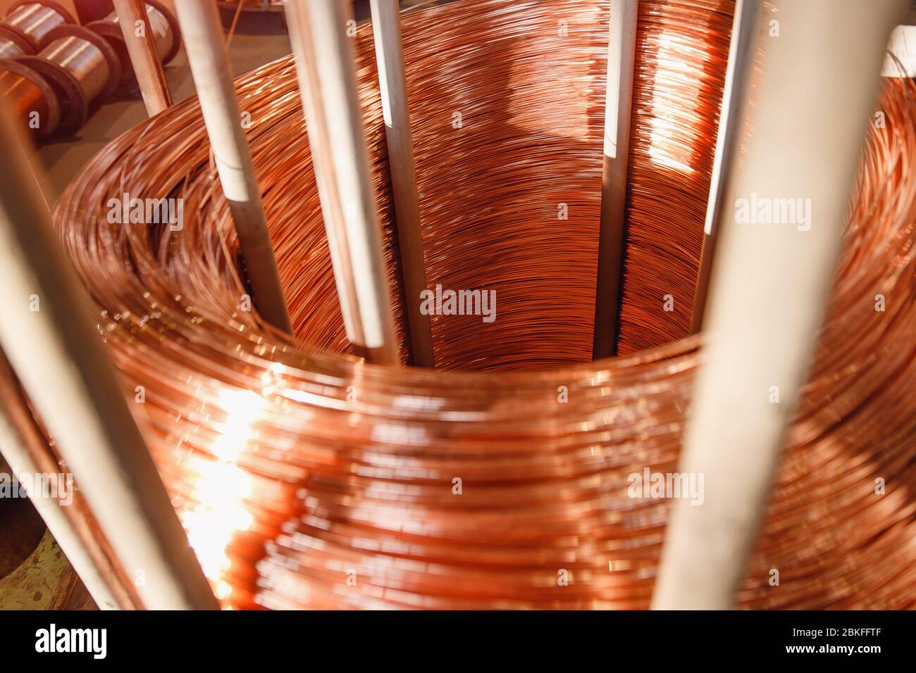 Production of copper wire, bronze cable in reels at factory Stock Photo ...