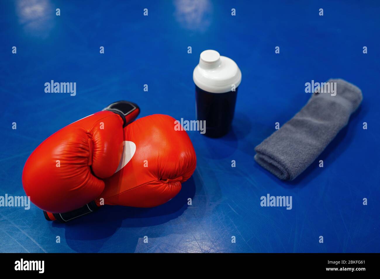 Boxing gloves, pads and equipment on ring, nobody Stock Photo - Alamy