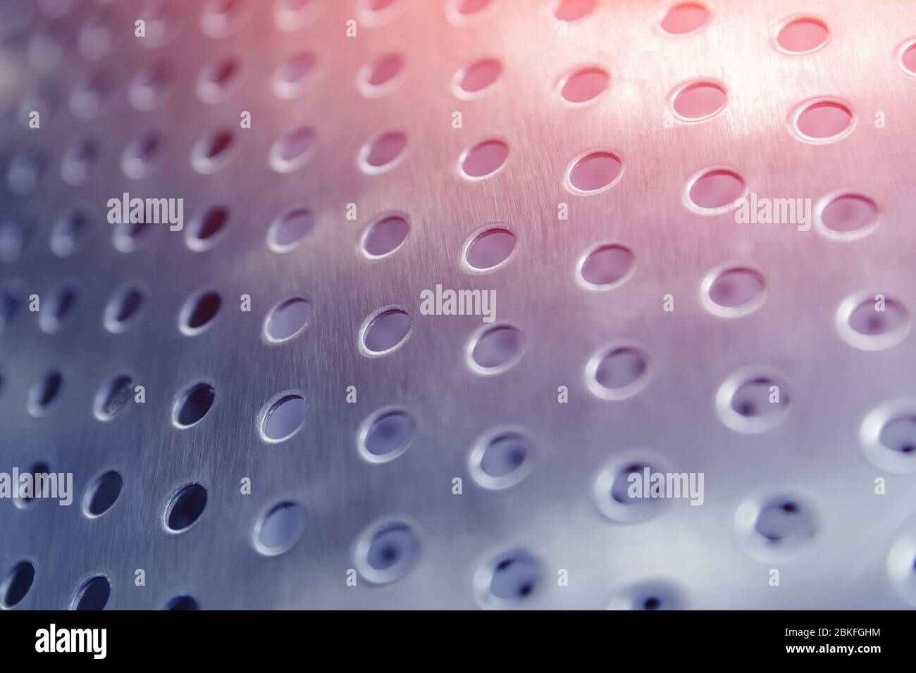 Industrial iron background in blue with professional holes and ...