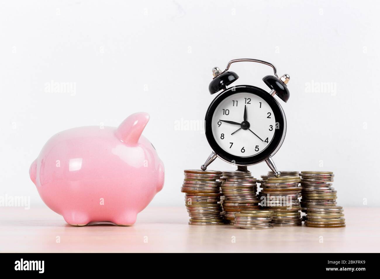 Money accumulation concept. Money and piggy bank isolated on white ...