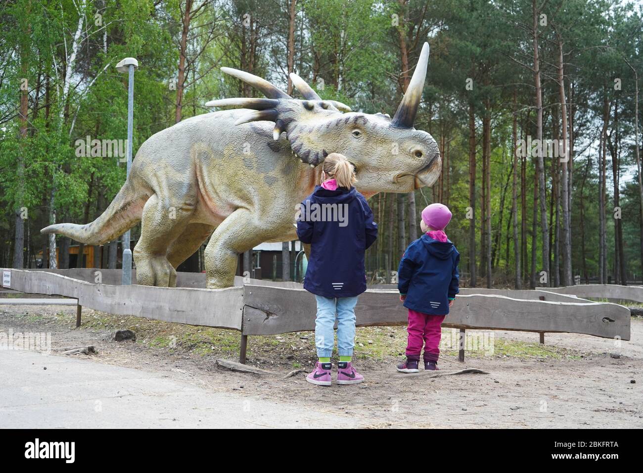 Berlin, Germany. 01st May, 2020. Children stand in front of a life-size ...