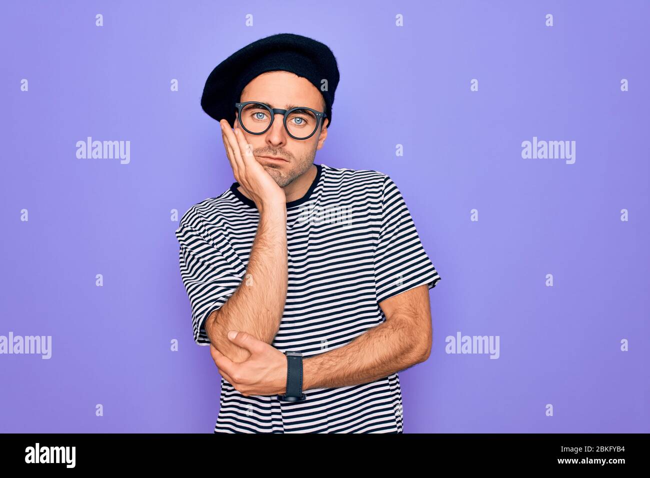 Dull blue beret hi-res stock photography and images - Alamy