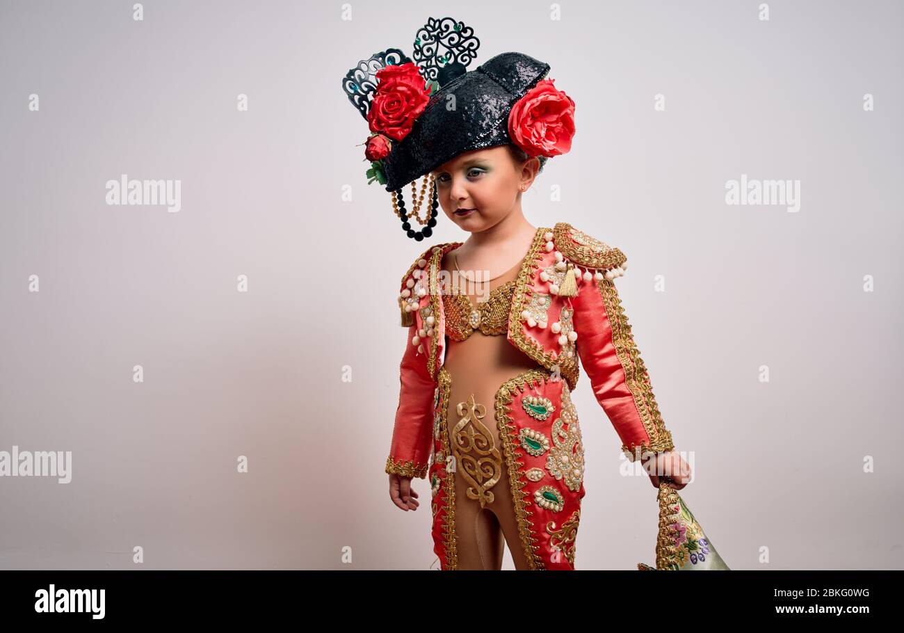 Young little caucasian kid girl wearing bullfighter traditional folkore ...