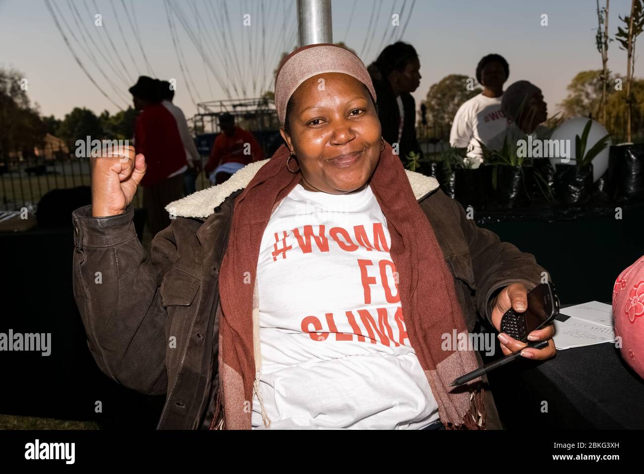 African woman flexing biceps hi-res stock photography and images - Alamy