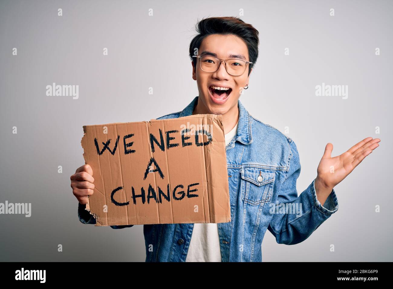 Young handsome chinese activist man protesting asking for change ...