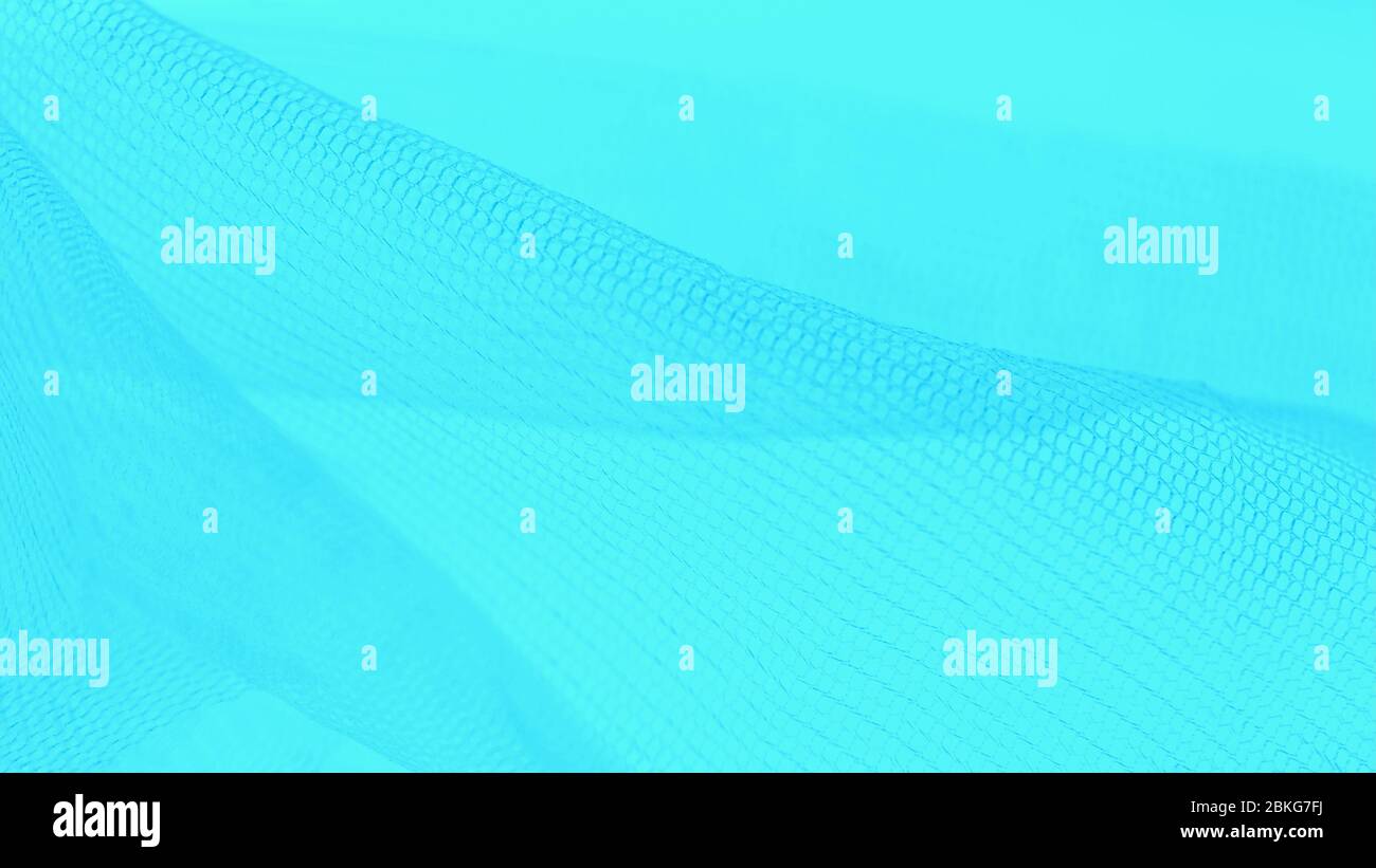 Light small mesh fabric on aqua aquamarine, background. 16:9 panoramic ...