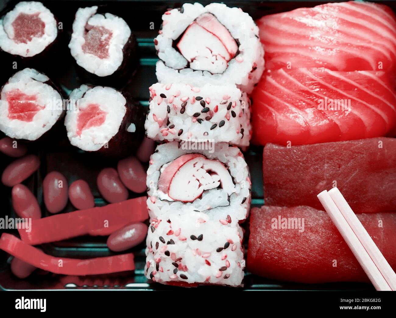 Sushi tray in red Stock Photo - Alamy