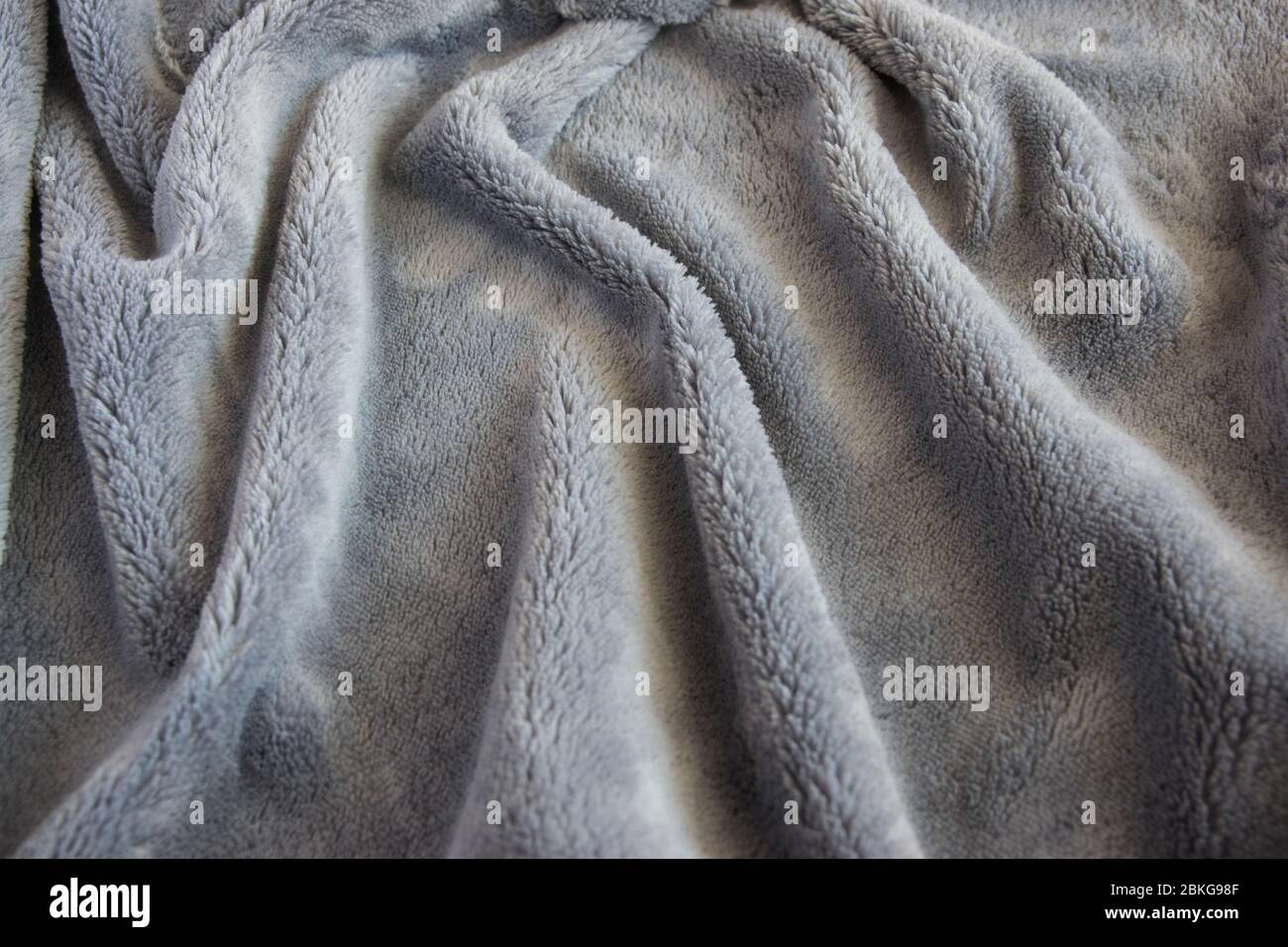 Texture fabric. Textile warm grey knitted cloth background Stock Photo ...