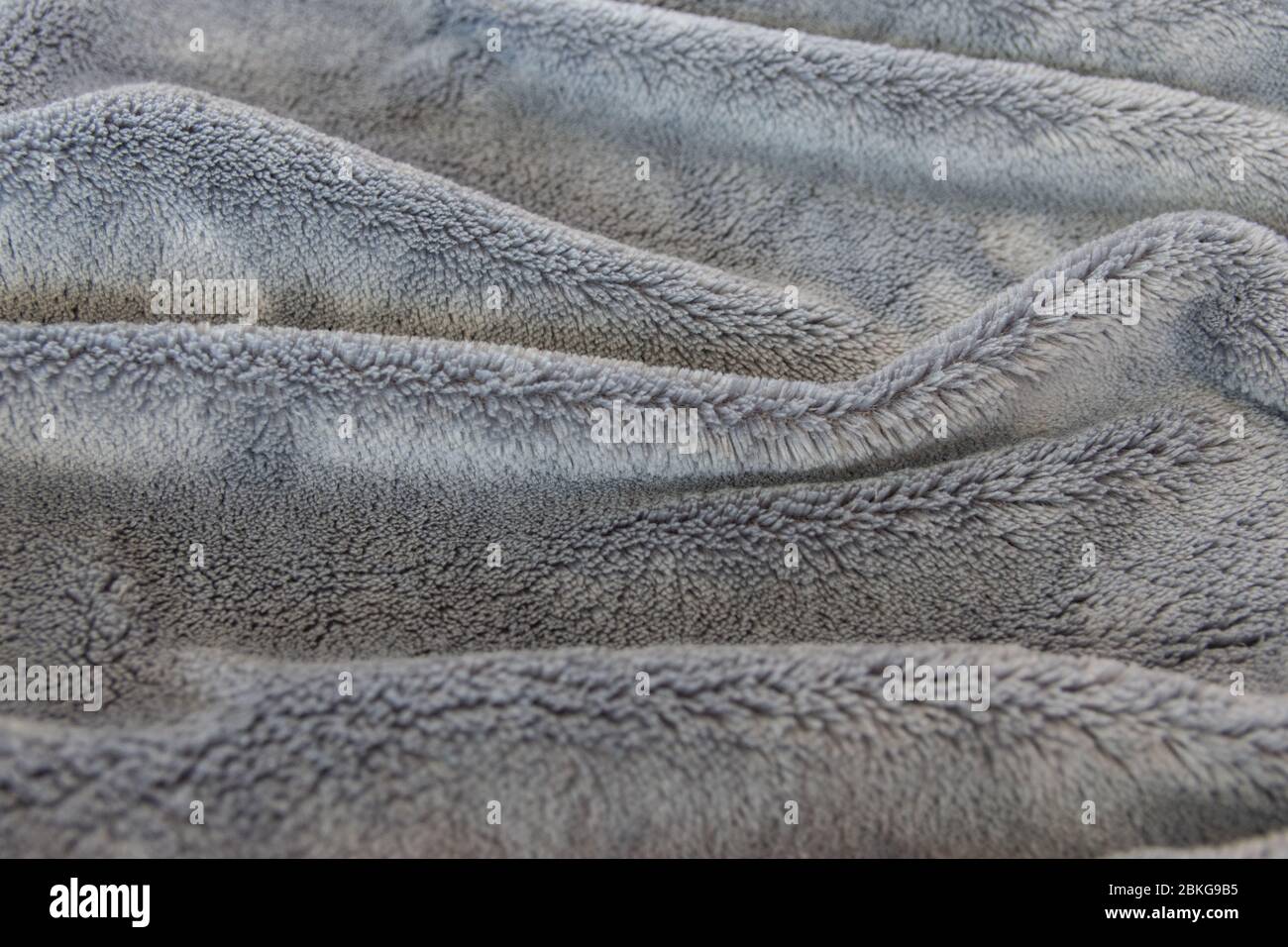 Texture fabric. Textile warm grey knitted cloth background Stock Photo ...
