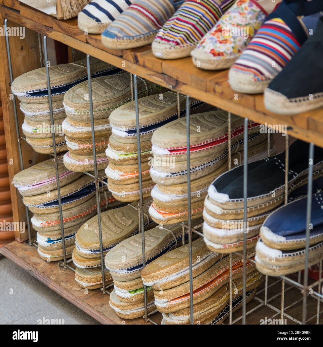 Collection of summer colorful shoes for women in wood shoe case in ...