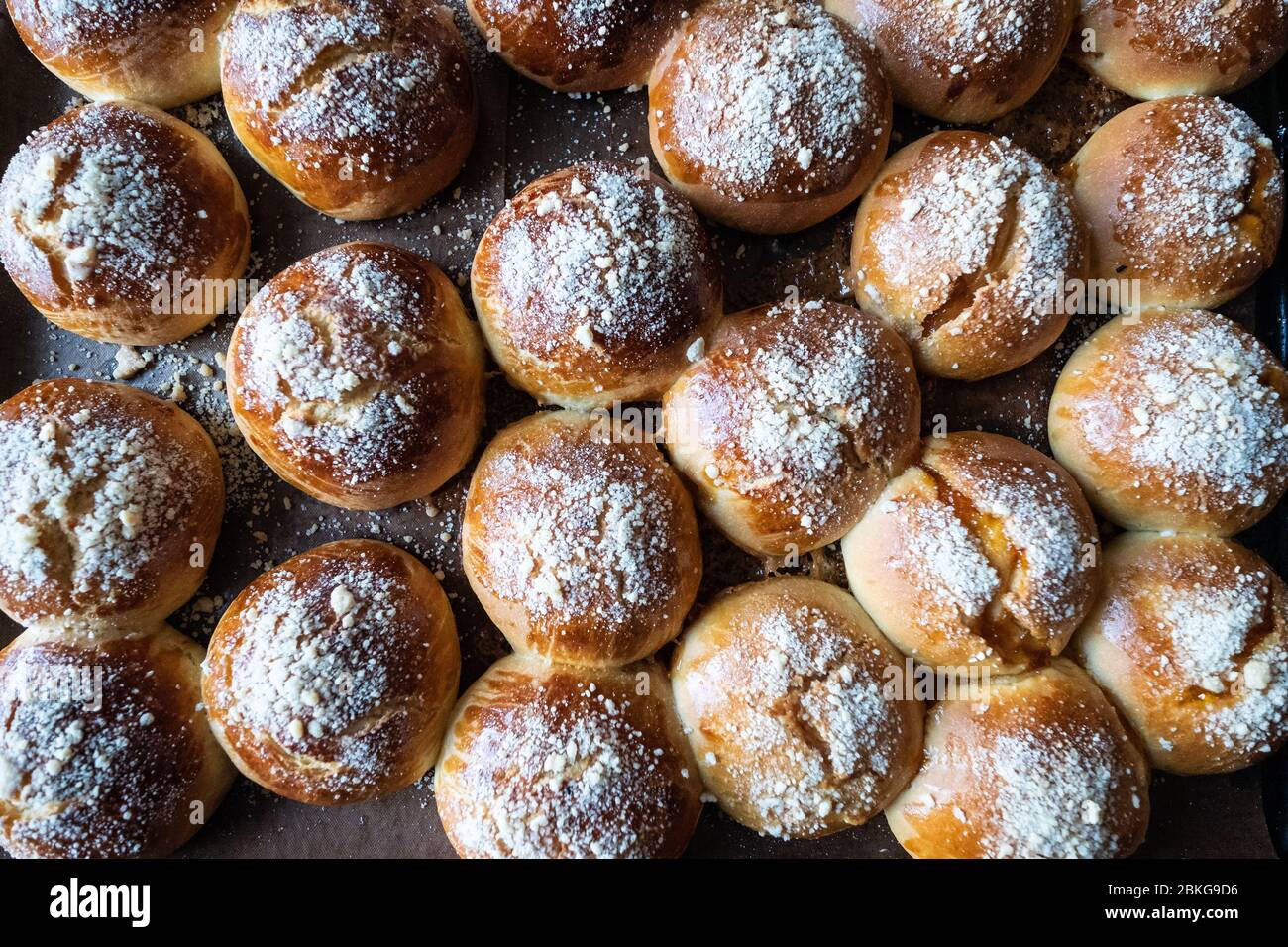 Whole grain buns on table. Fresh baked buns for breakfast Stock Photo ...