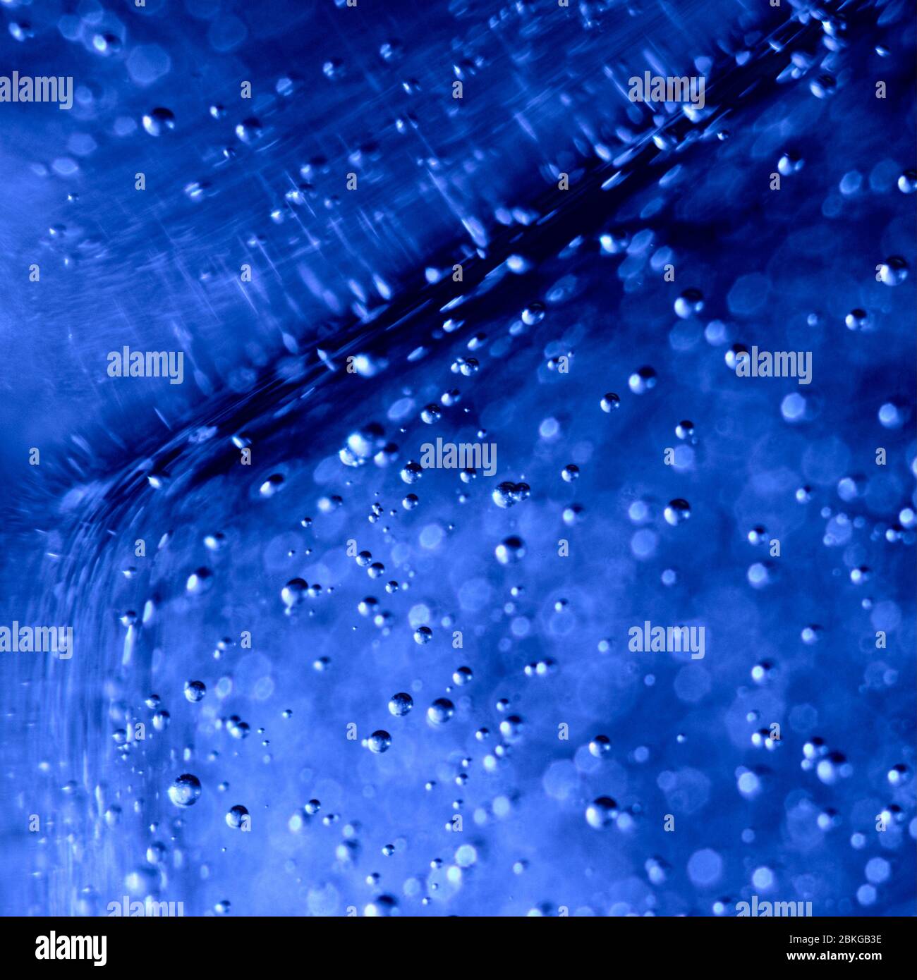 Blue bubbles flying inside three dimensional illuminated space Stock ...