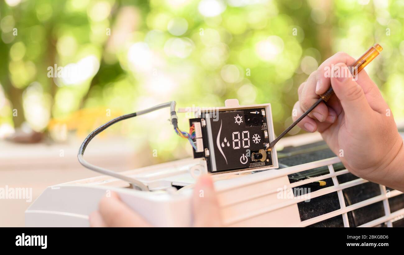 Repair and fix air conditioner at home. Lock down and Self-quarantine ...