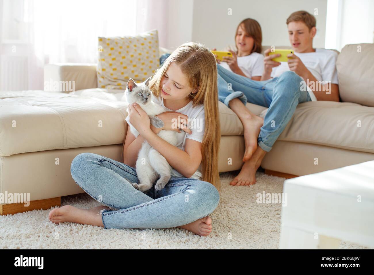 Children play at home Stock Photo - Alamy