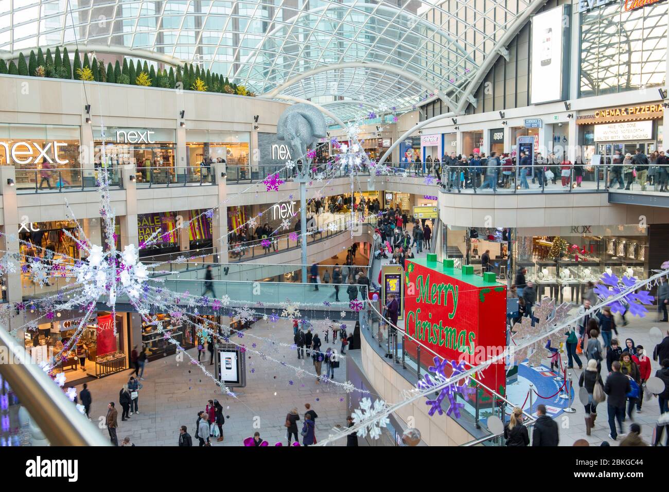 Inside view of a busy Trinity Centre in Leeds with Christmas ...