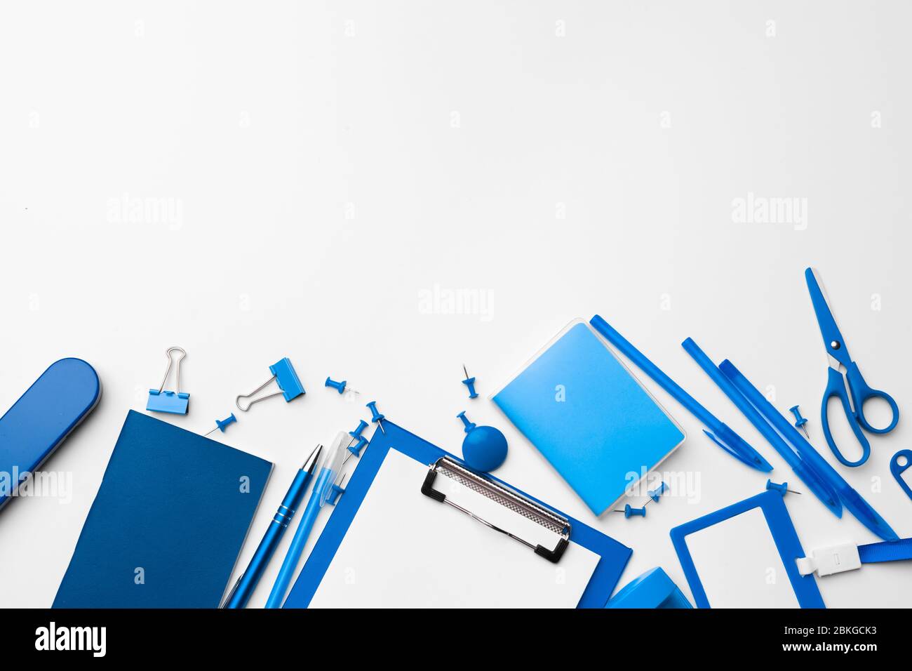 blue color stationery set as pattern with copy space on white ...
