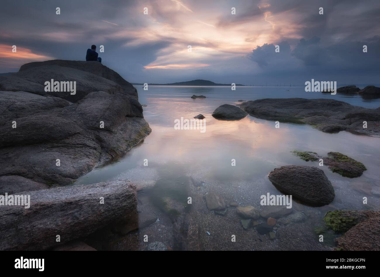 Magnificent cloudy sunset over the sea. Spring sunset, landscape ...