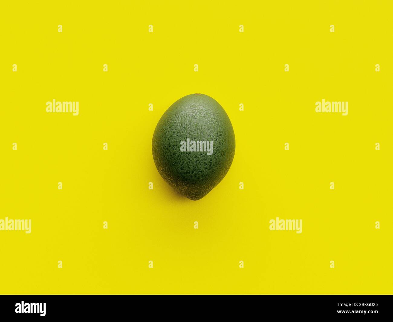 One green lime over a vibrant yellow background viewed from above - 3d ...