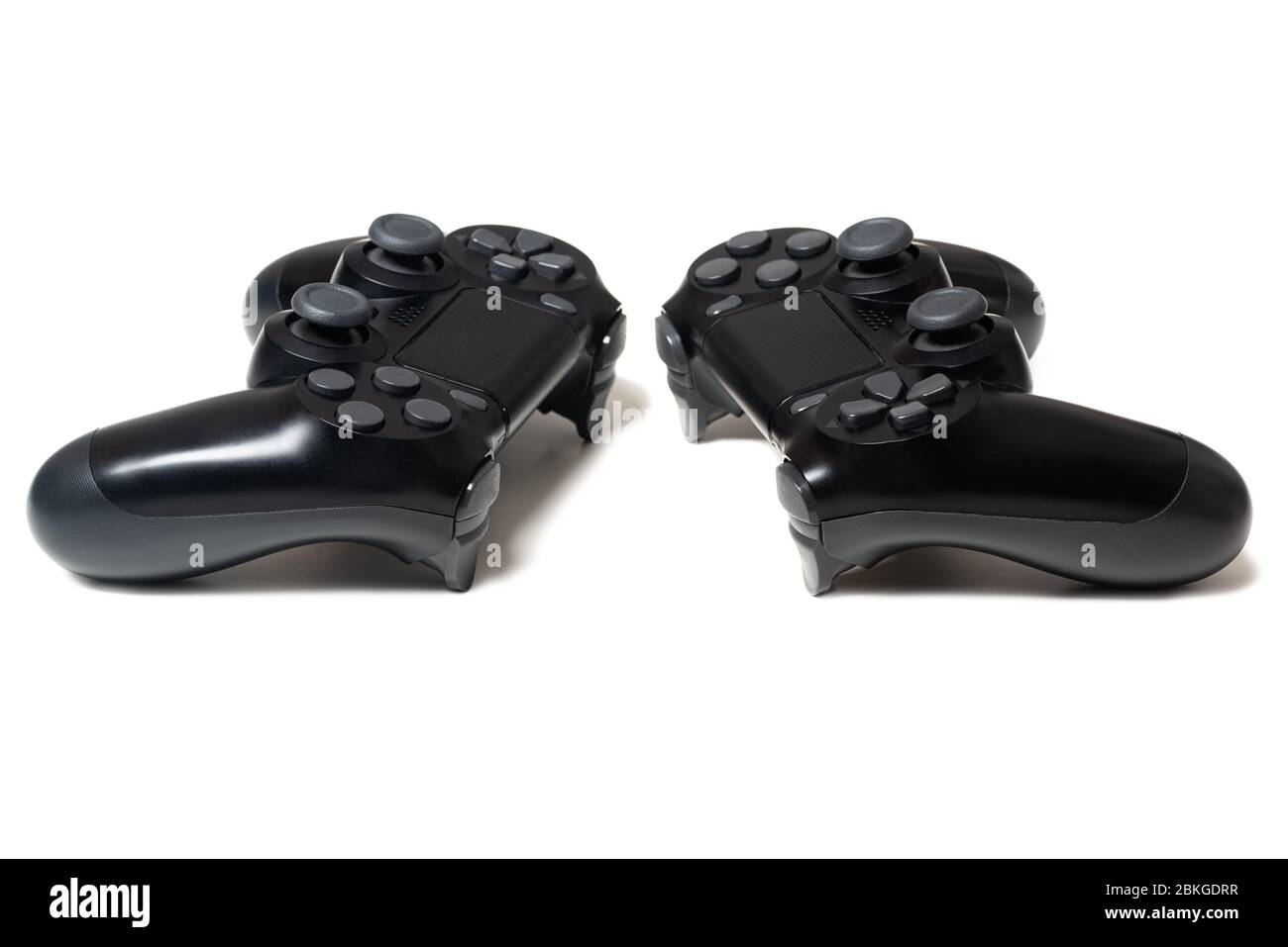 Pair of two video game controllers closeup white background Stock Photo ...